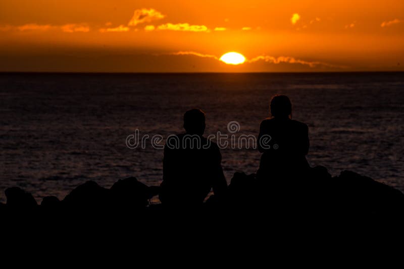 Sun Setting on the Ocean stock image. Image of beach - 161317091