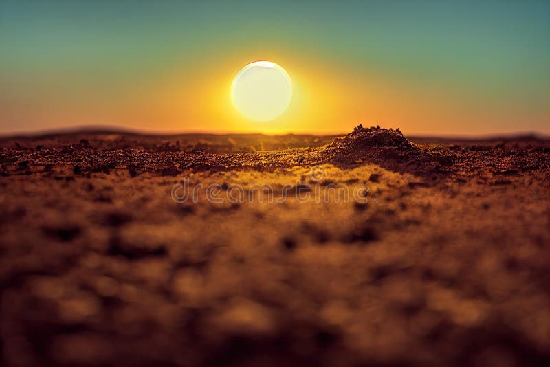 A Sun Setting Over a Desert with a Small Mound of Dirt in the ...