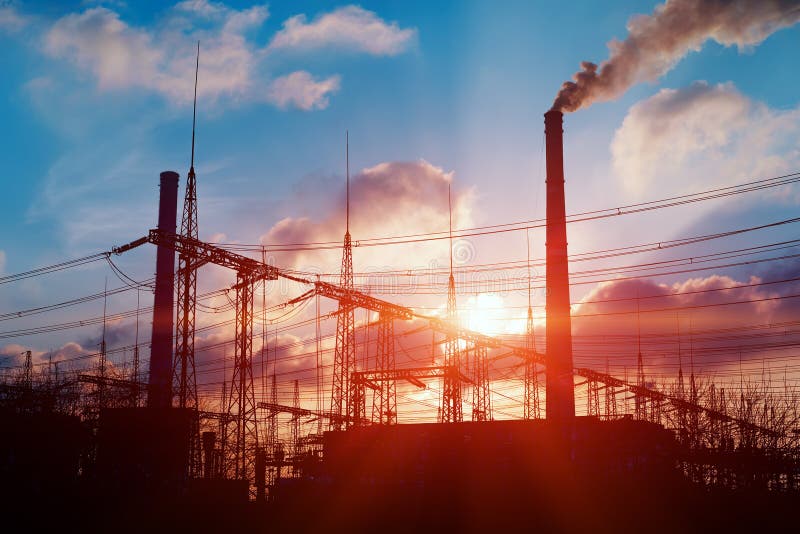 Sun Setting Over an Electrical Substation and Power Plant. Stock Photo ...