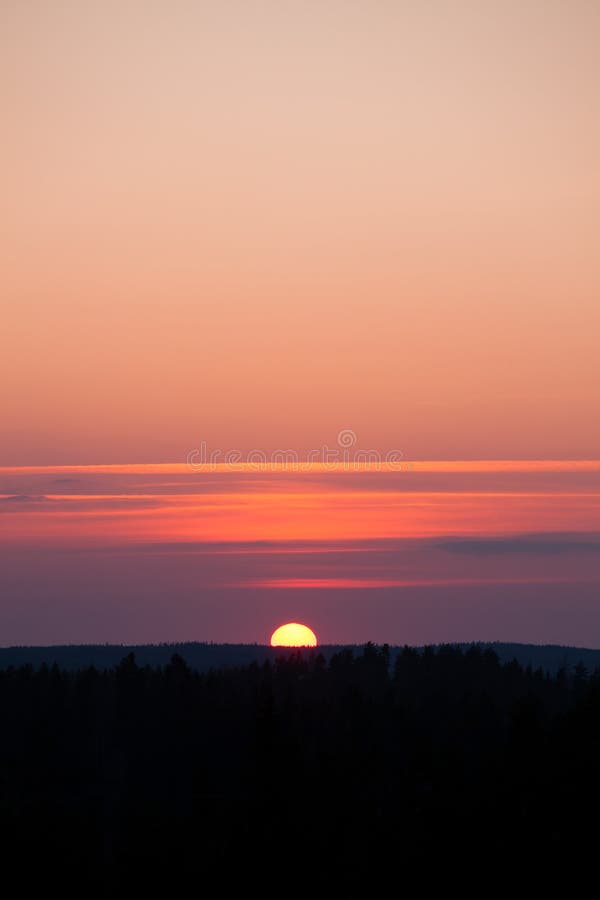 Sun setting over forest stock image. Image of cloudscape - 57661975
