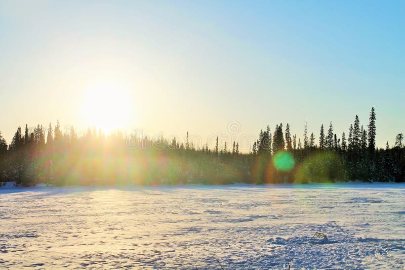 Sun Setting Over Frozen Lake Stock Image - Image of snow, weather ...