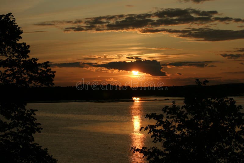 Sun Setting Over Lake stock image. Image of night, light - 108922941