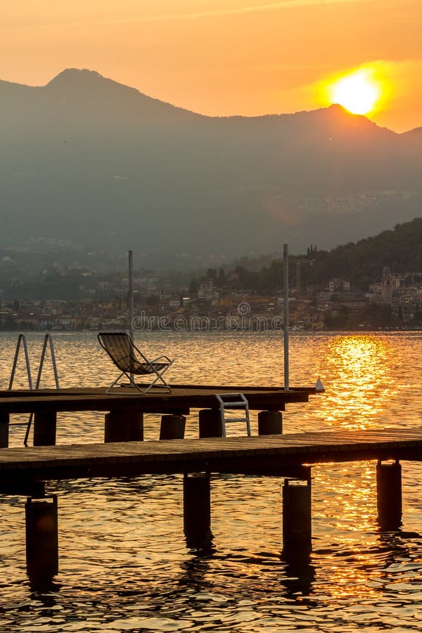 Sun Setting Over Lake Garda and Mountains Editorial Stock Image - Image ...