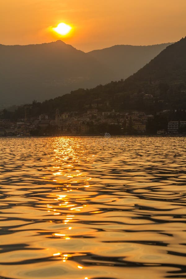 Sun Setting Over Lake Garda and Mountains Stock Photo - Image of italy ...
