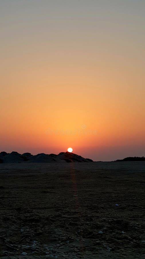 Sun Setting Over the Mountain Stock Photo - Image of sunset, mountain ...