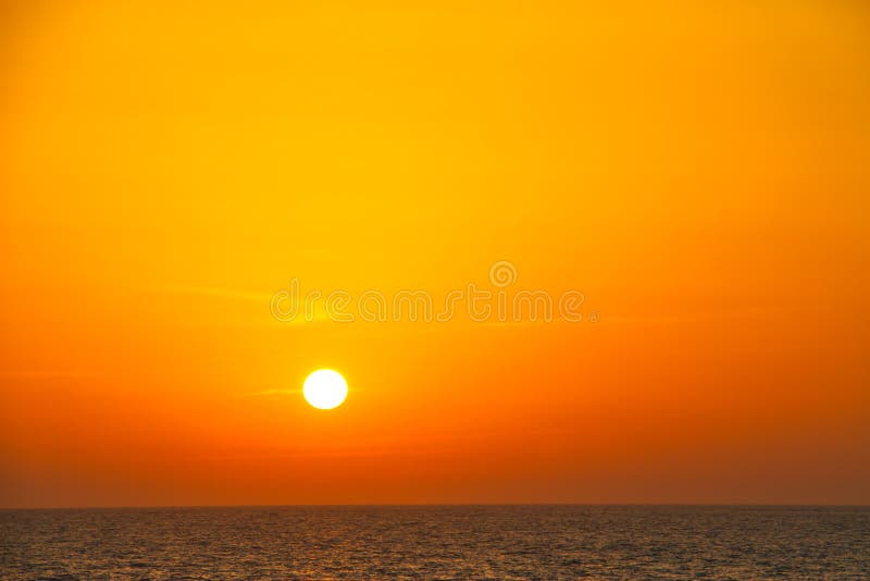 Sun Setting Over the Ocean stock photo. Image of atlantic - 129936924