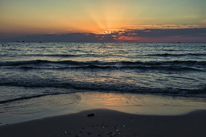 Sun Setting Over the Ocean at Golden Bay, Malta Stock Image - Image of ...