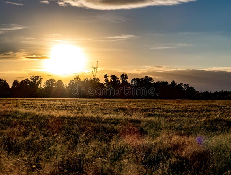 The Sun Setting Over the Vast Plain. Stock Photo - Image of vast ... The Sun Setting Over the Vast Plain. Stock Photo - Image of vast ...