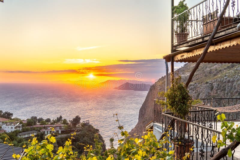 Sun Setting Over the Trees and Buildings while Sun Sets Over ...