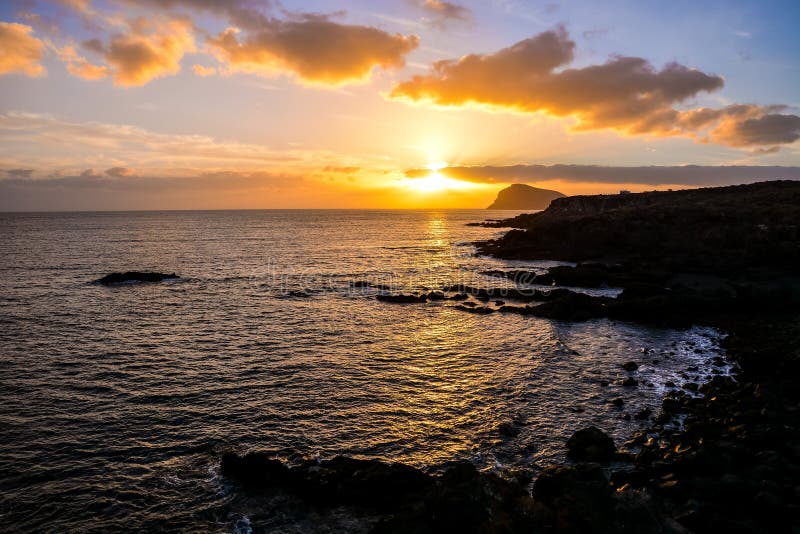 The Sun Setting in the Sea stock photo. Image of rare - 112173088