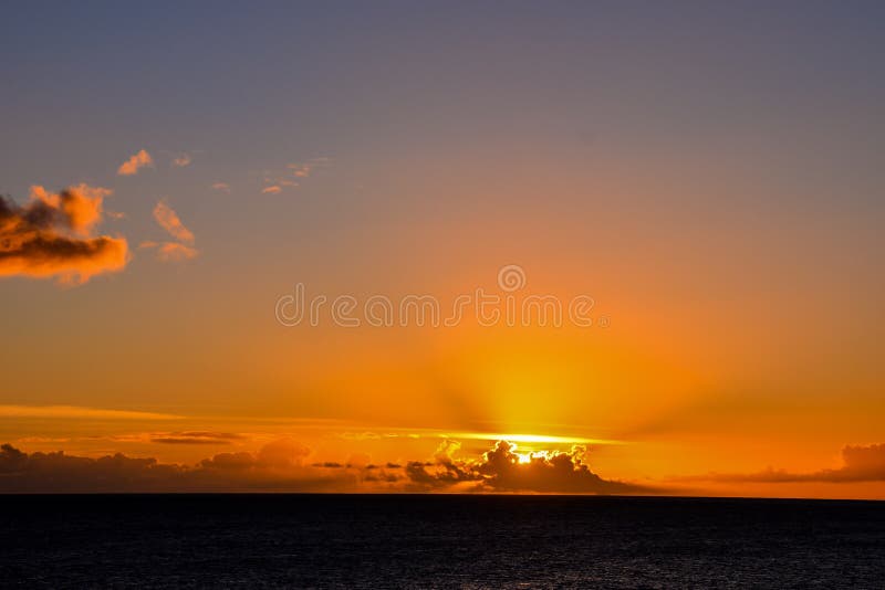 The Sun Setting in the Sea stock image. Image of water - 169234077