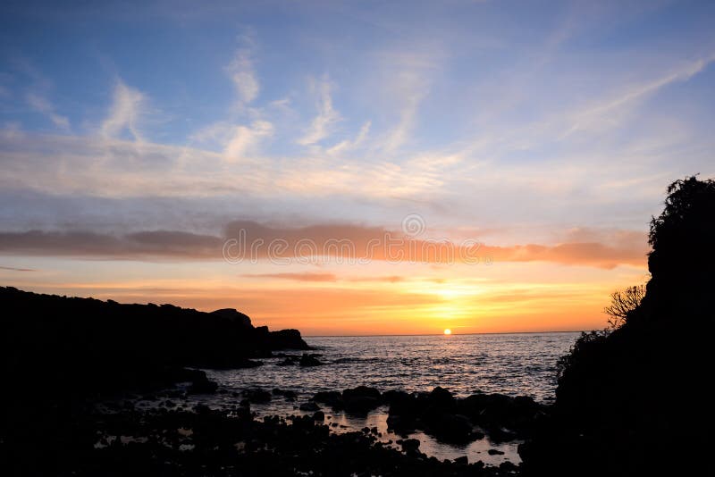 The Sun Setting in the Sea stock image. Image of islands - 173778889