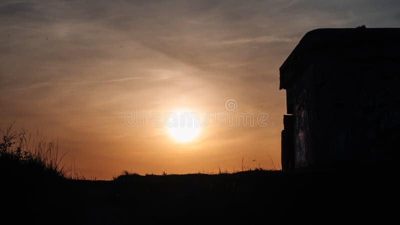 A Sun is Setting in the Sky and the Sky is Dark Stock Image - Image of ...