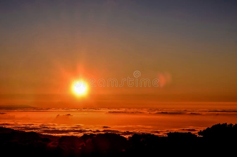 The Sun is Setting and the Sky is Orange Stock Image - Image of ...