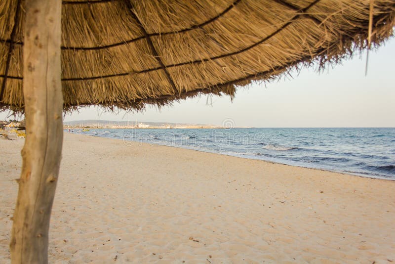 Sun shade on the beach stock image. Image of sand, mediterranean - 27880175