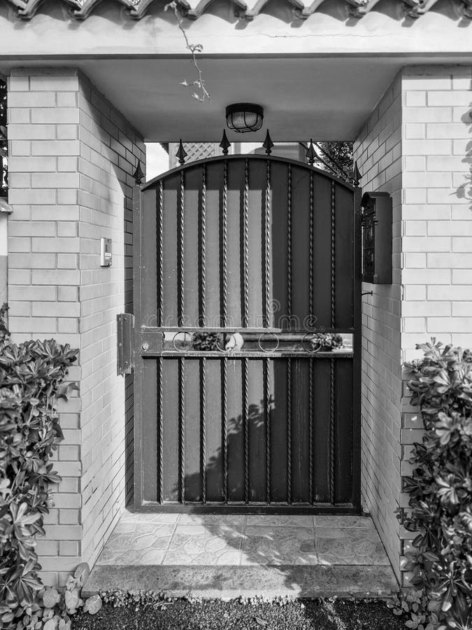 Sun Shadow on Iron Gate at Dusk in Fiumicino, Italy. Stock Photo ...