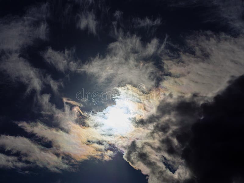 The Sun Shines into Overcast Dark Yellow-blue Clouds Stock Image ...