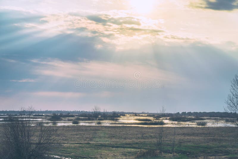 The Sun Shines through the Rain Clouds Stock Image - Image of clouds ...