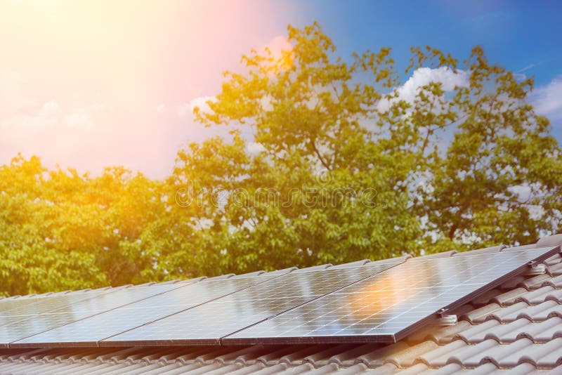 Sun Shines on Roof with Solar System in Summer Stock Photo - Image of ...