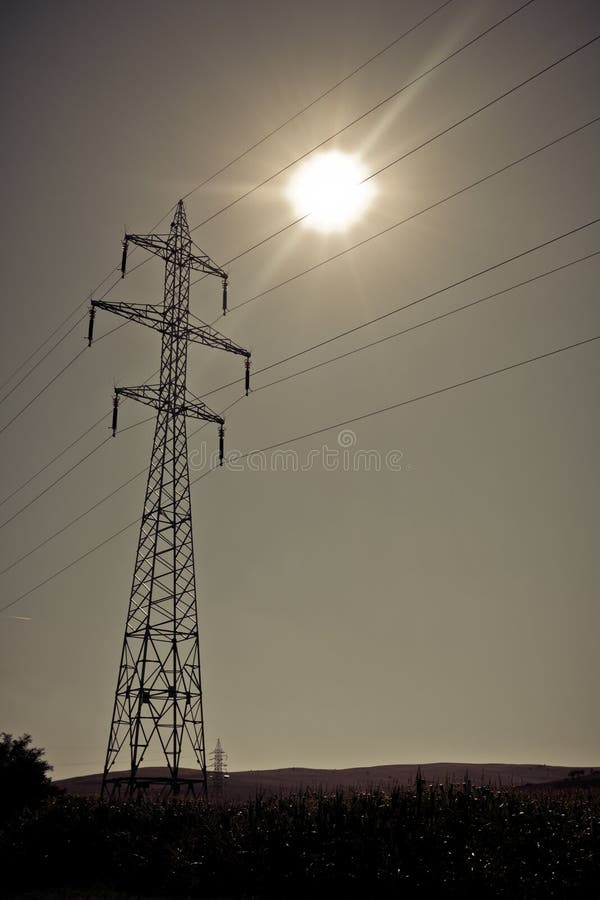 Sun Shining Above High Voltage Power Lines on Power Pylon Stock Image ...