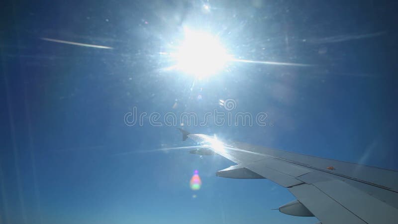 Sun Shining through Airplane Window with View of Plane Wing Stock ...