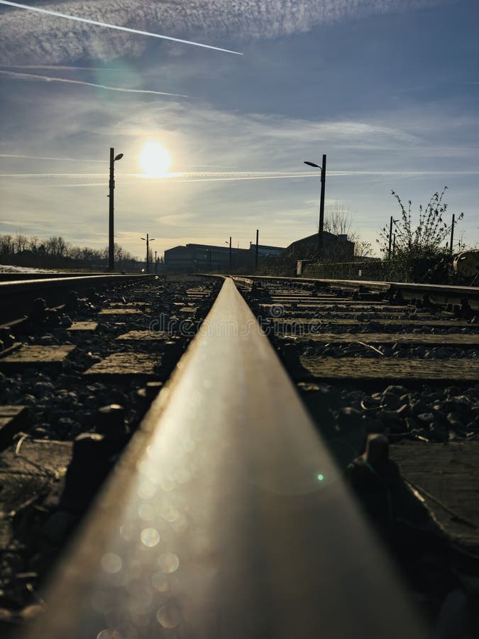 Sun Shining on Empty Railroad Tracks Stock Image - Image of perspective ...