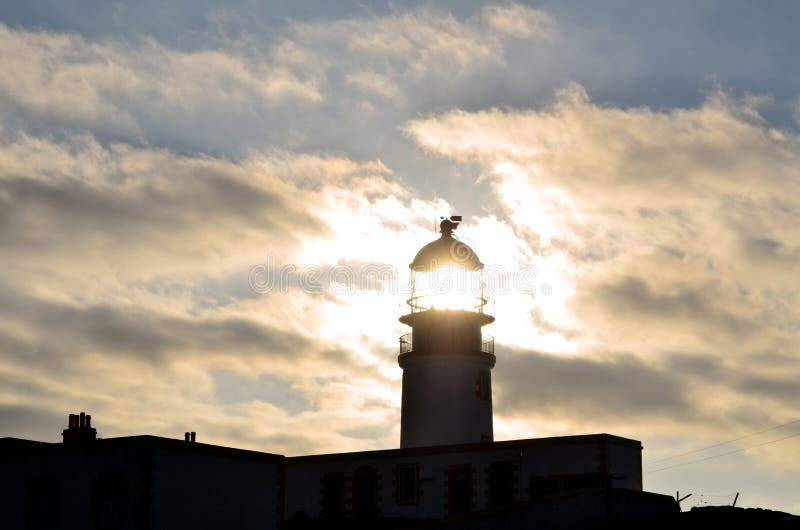 Sun Shining through the Lighthouse at Neist Point Stock Image - Image ...