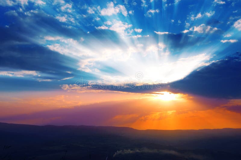 Sun Shining through the Low Clouds of Twilight Stock Photo - Image of ...