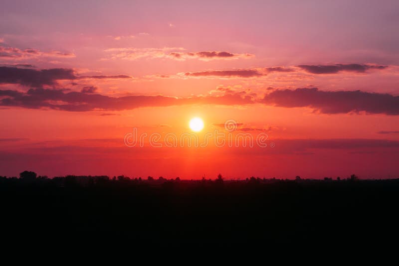 Sun Shining Over Dark Ground during Sunrise. Sunset Sky Landscape Stock ...