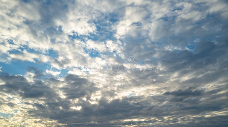 Sun Shining through the Puffy Clouds. Sky View. Beautiful Sunny Sky. Background with Clouds on ...