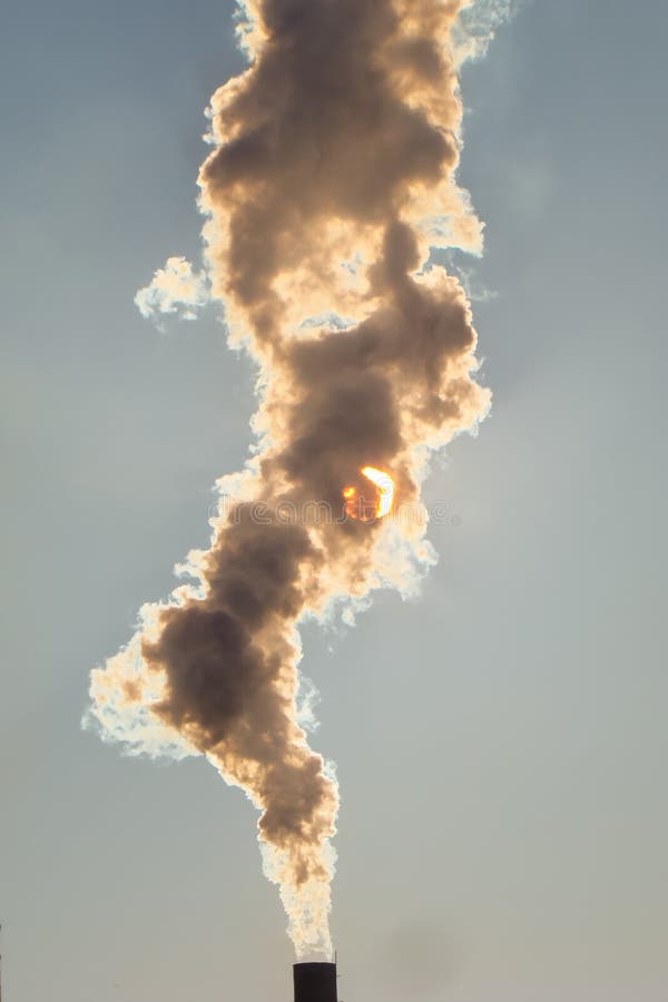 Sun shining through smoke stock image. Image of chimneys - 49784901