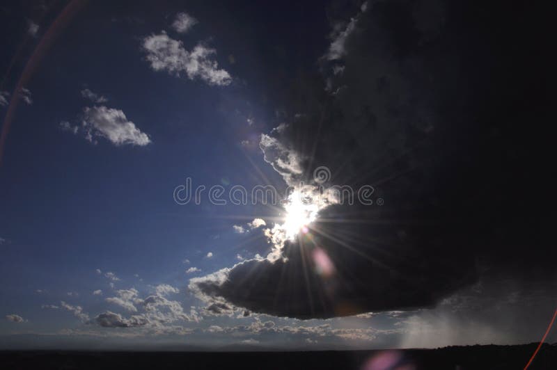 Sun Shining through Storm Clouds Stock Photo - Image of overcast ...