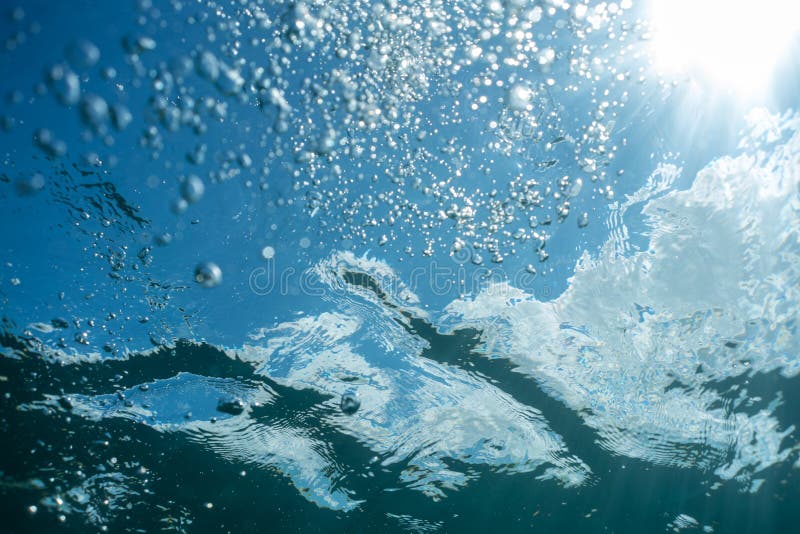 Sun Shining through the Water Surface Stock Image - Image of deep ...