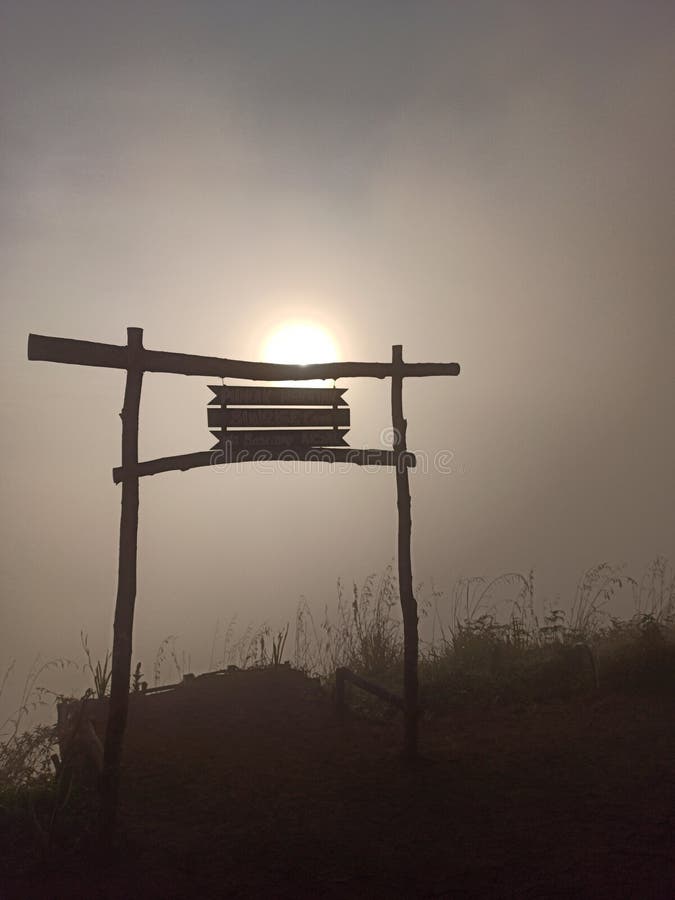 The Sun Shrouded in Mist on the Mountain Peaks Stock Photo - Image of ...