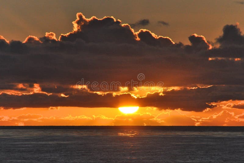 Sun Sinking stock photo. Image of rays, ocean, sunset - 39577286