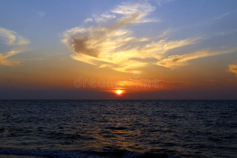 The Sun Sets Over the Horizon Stock Image - Image of sets, clouds ...