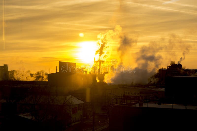 The sun through the smoke stock photo. Image of urban - 63535302
