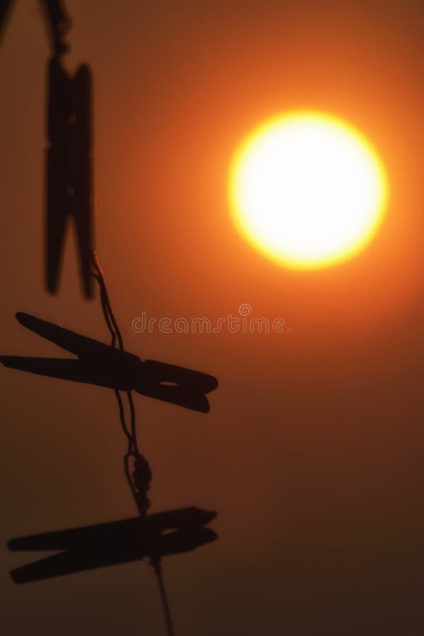 Sun and smoke stock photo. Image of silhouette, dusk - 85985696