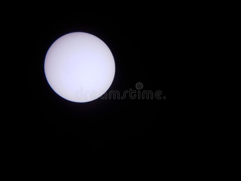 Sun through a Solar Filter and Telescope with Planet Mercury Stock ...