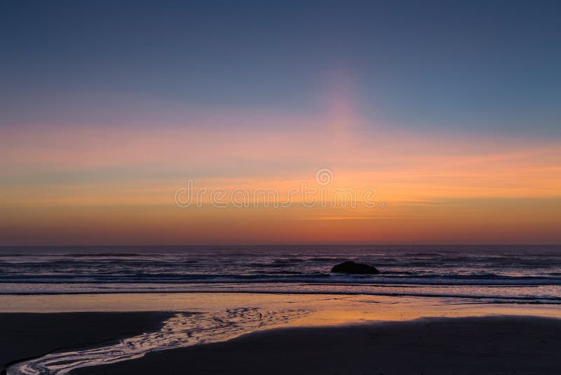 Sun spike on Oregon coast stock photo. Image of creek - 75648600
