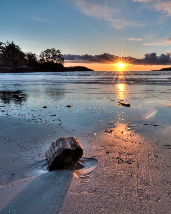 Sun Star Casting Shadow on Beach Wood Stock Image - Image of calm ...
