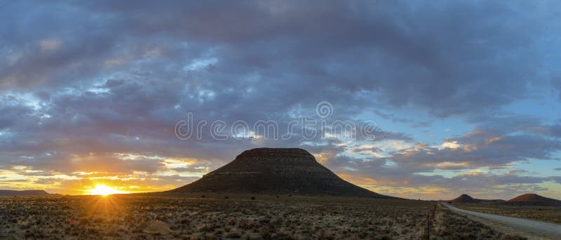 Sun startburst at sunset stock photo. Image of arid - 116744020