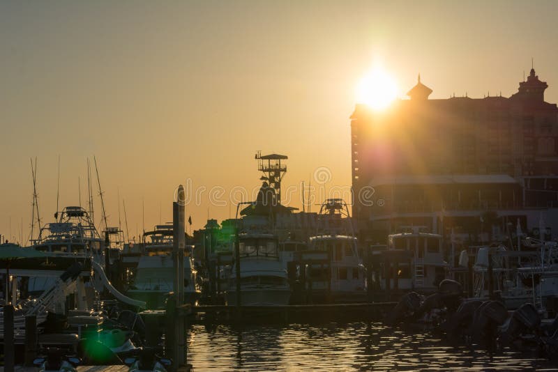 Sun at Sunset and Cityscape in a Torrid Day. Destin Beach, Florida ...
