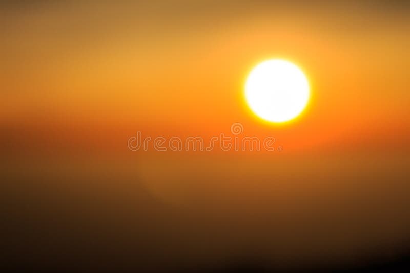 The Sun at Sunset Over the Heavy Evening Sea Stock Photo - Image of ...