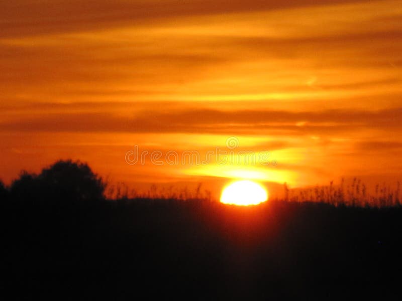 Sinking Sun stock image. Image of sinking, sunset, orange - 127484073