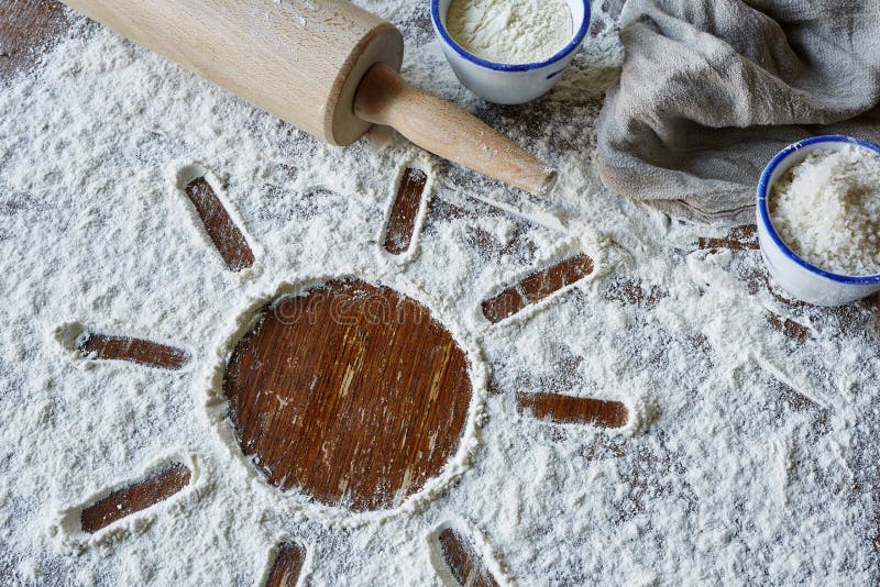 Sun Symbol in Flour with Utensils for Baking Stock Image - Image of ...