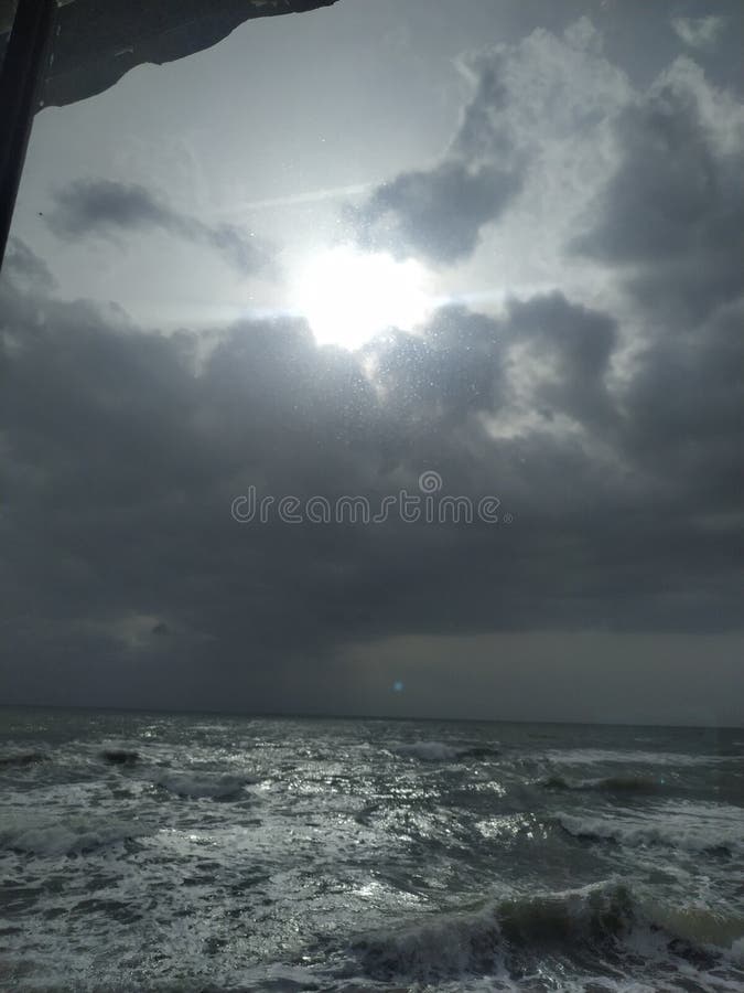 Sun Takes a Glance F Om the Clouds Stock Photo - Image of wall, takes ...