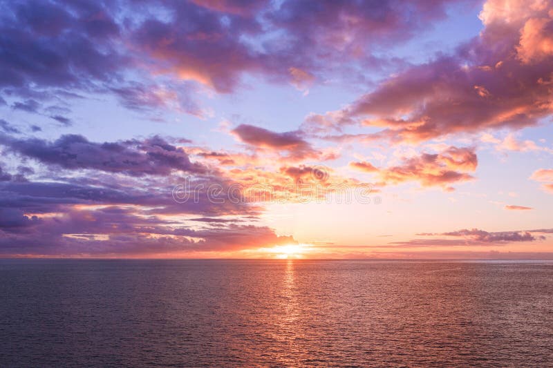 The Sun To Set Over the Horizon Reflected in the Sea Stock Image ...