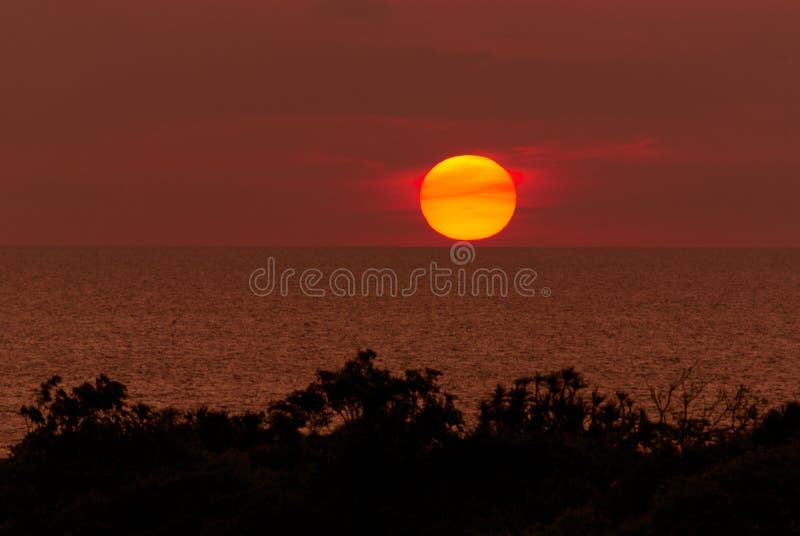 The Sun Touching Horizon Line Stock Image - Image of horizon, embracing ...