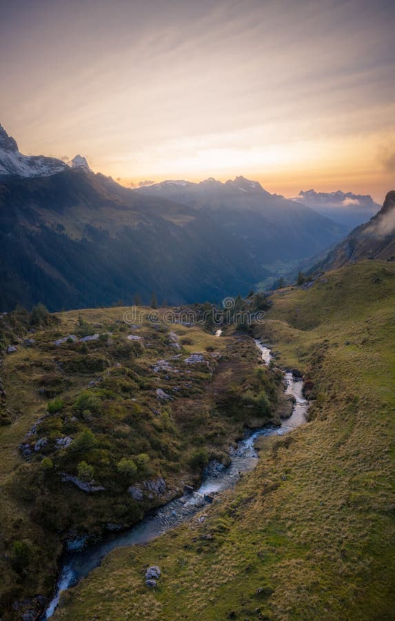Sun walk in the mountains stock image. Image of blue - 267737311